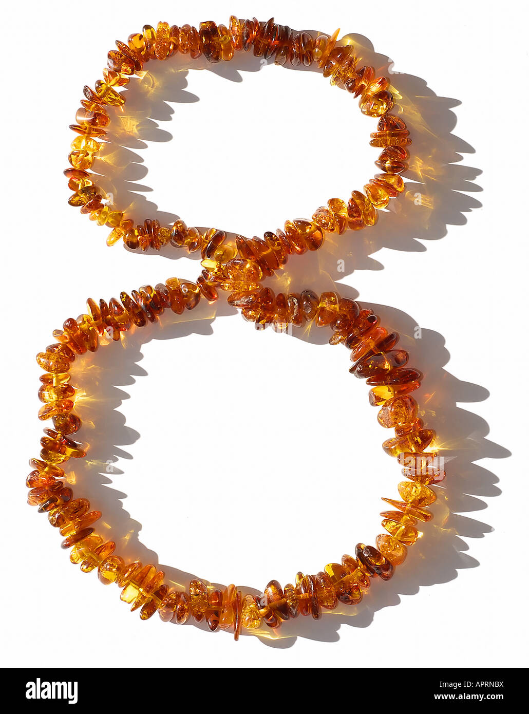 symbol made with Amber Beads Stock Photo - Alamy