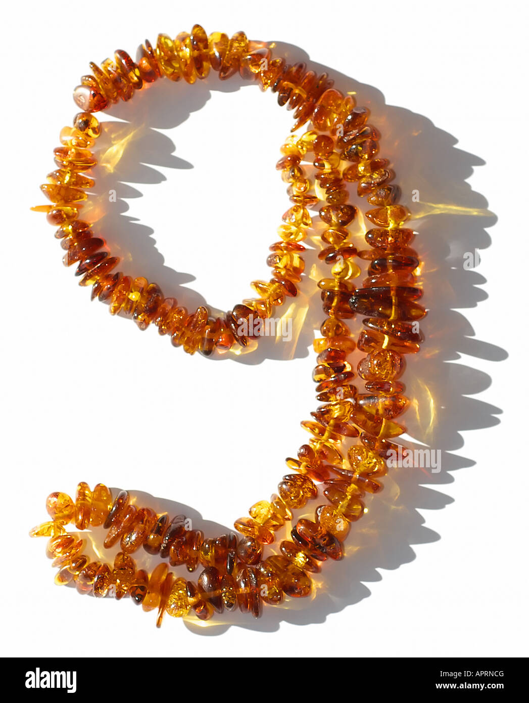 symbol made with Amber Beads Stock Photo - Alamy