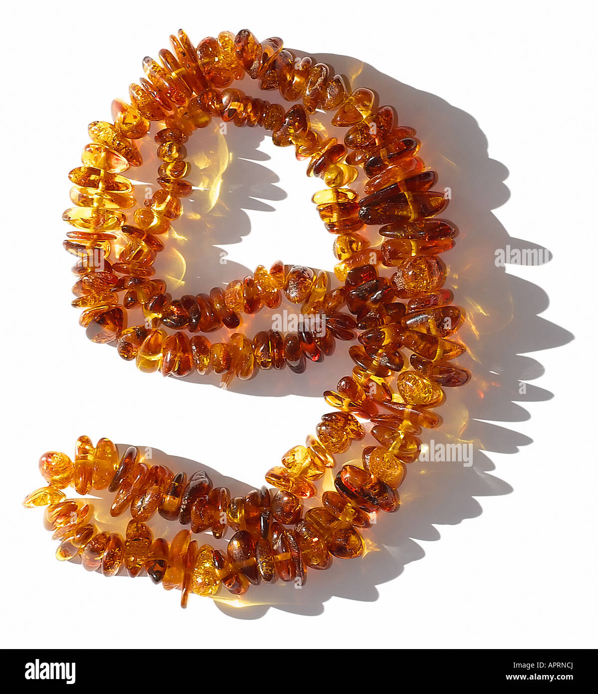 symbol made with Amber Beads Stock Photo - Alamy
