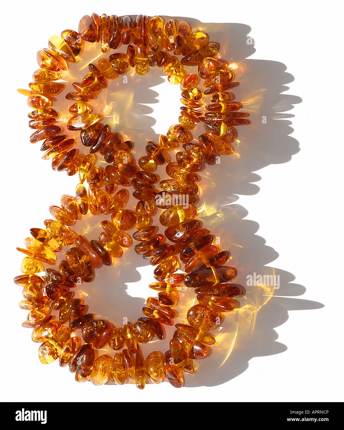 symbol made with Amber Beads Stock Photo - Alamy