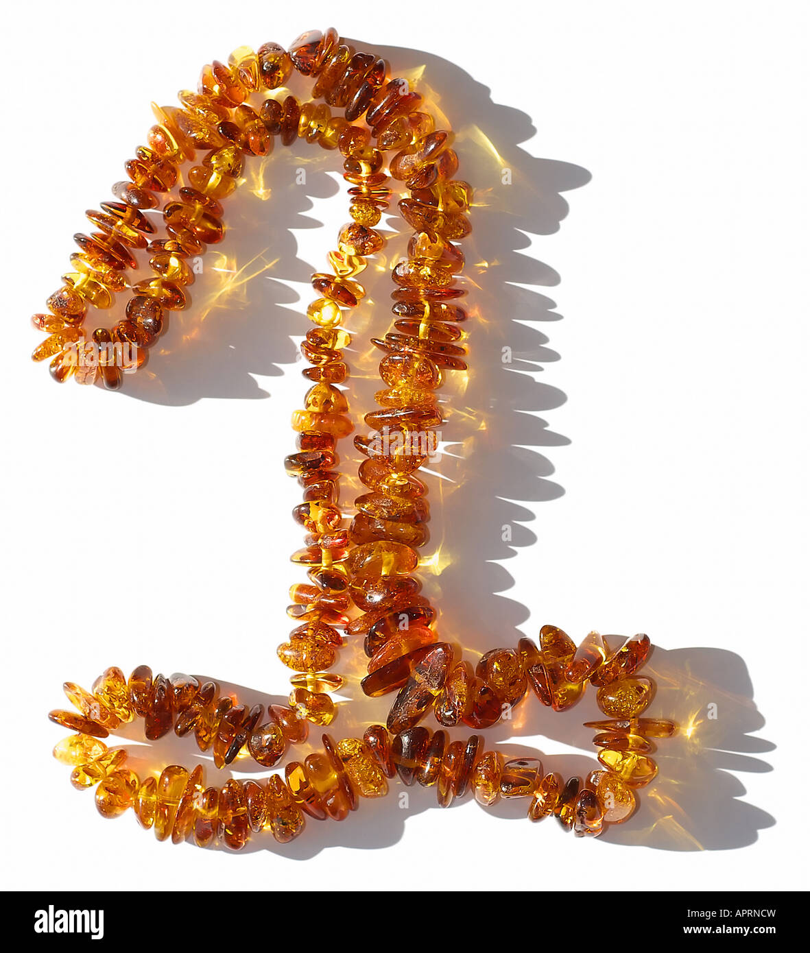 symbol made with Amber Beads Stock Photo - Alamy