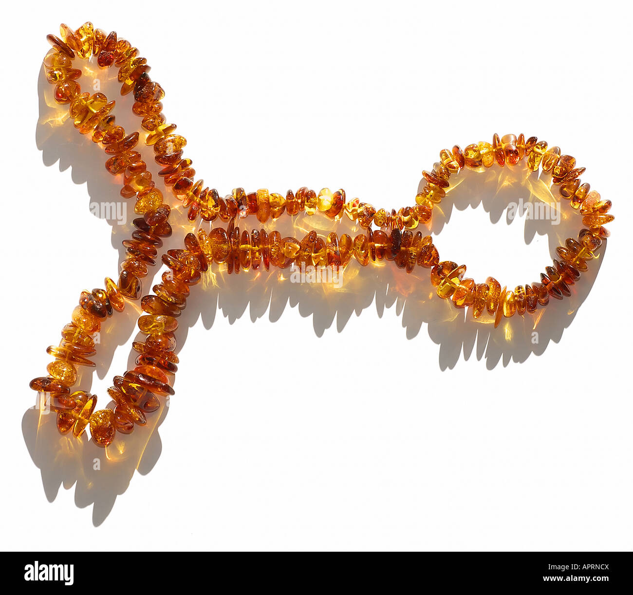 symbol made with Amber Beads Stock Photo - Alamy