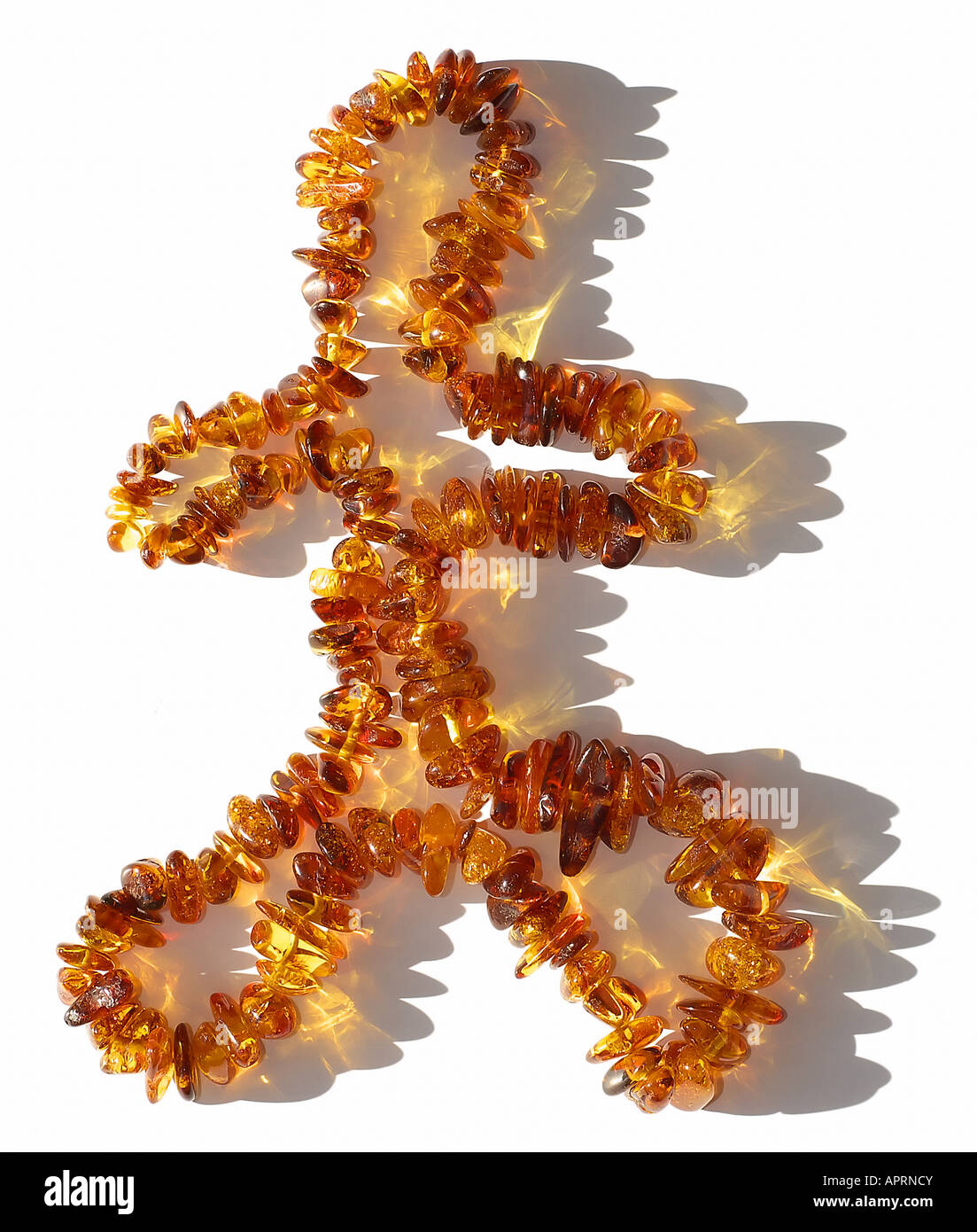 symbol made with Amber Beads Stock Photo - Alamy