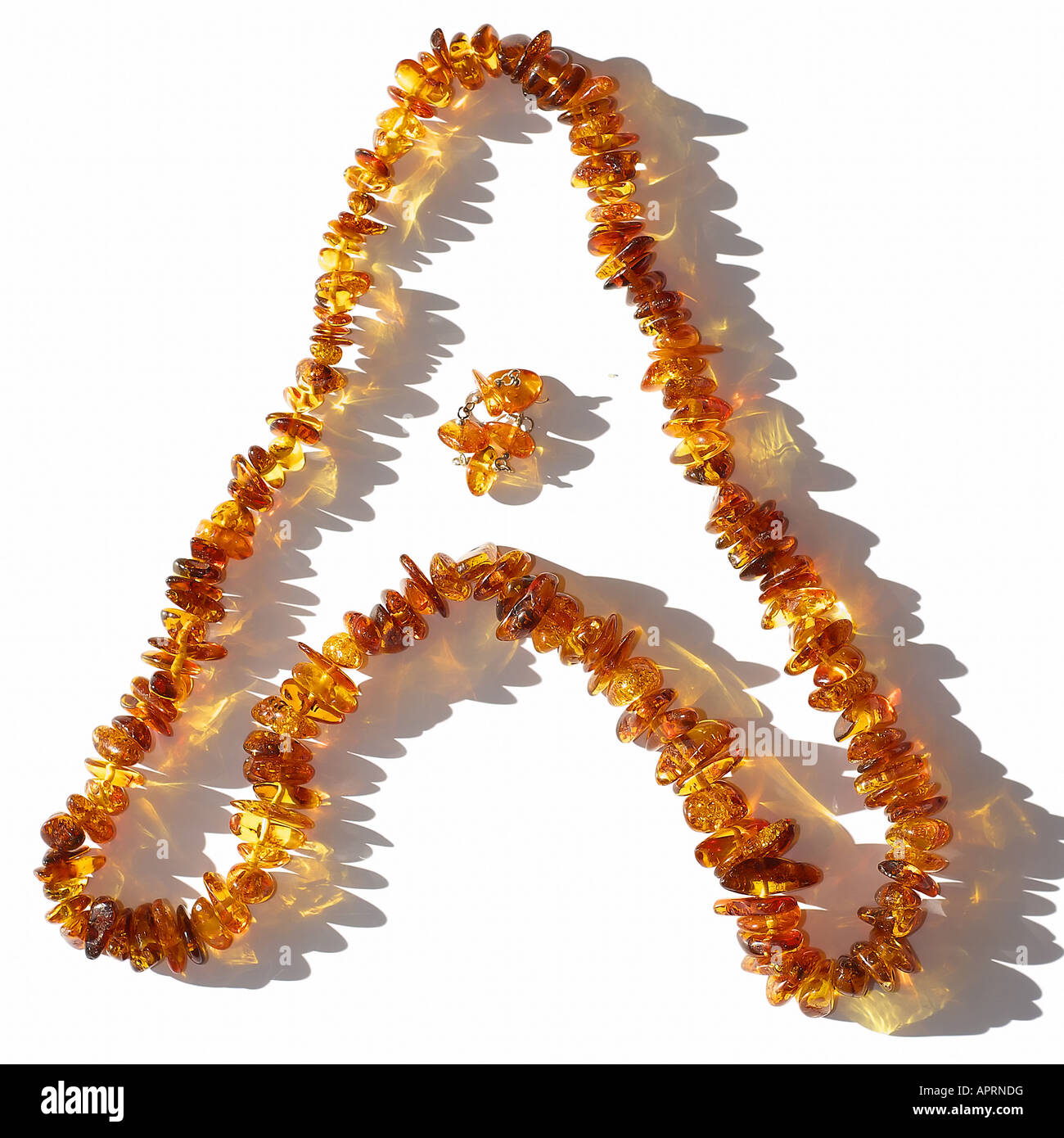 symbol made with Amber Beads Stock Photo - Alamy
