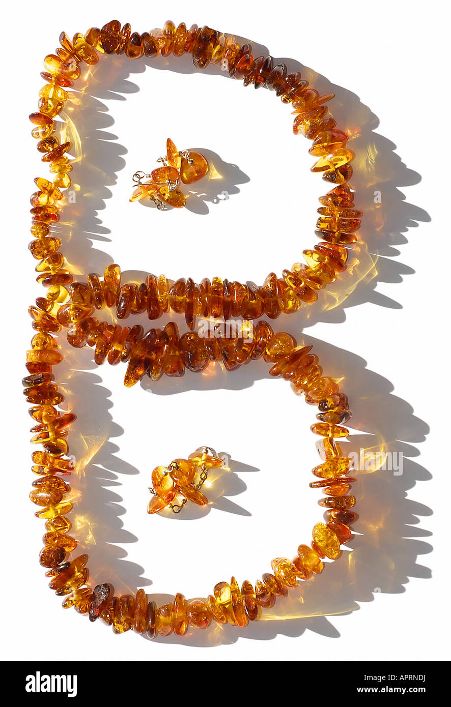 symbol made with Amber Beads Stock Photo - Alamy
