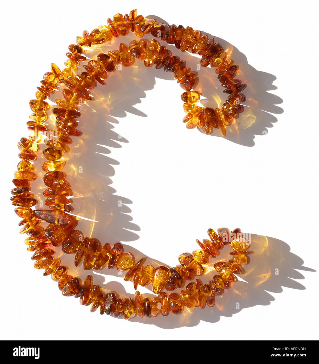symbol made with Amber Beads Stock Photo - Alamy