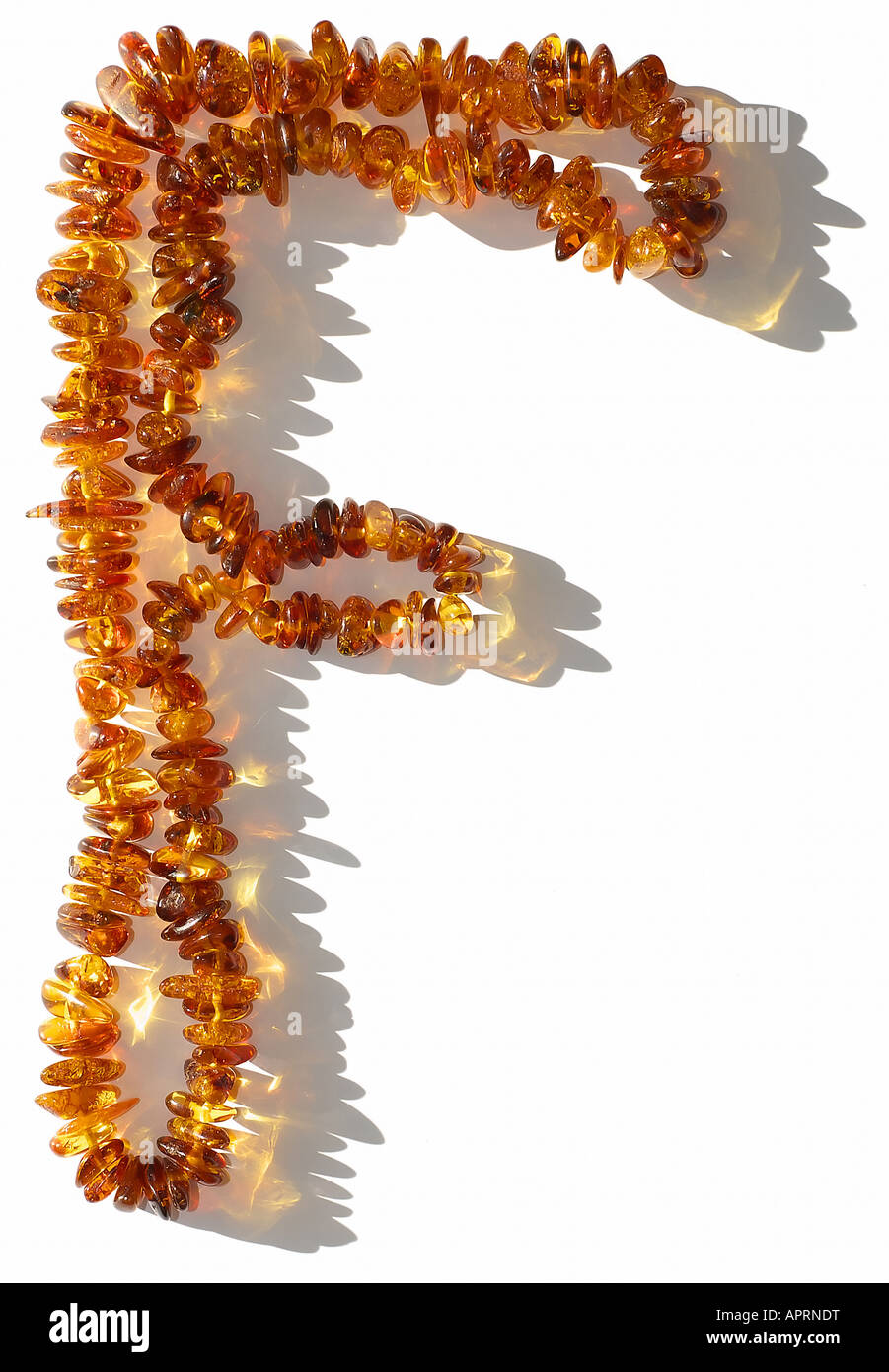 symbol made with Amber Beads Stock Photo - Alamy