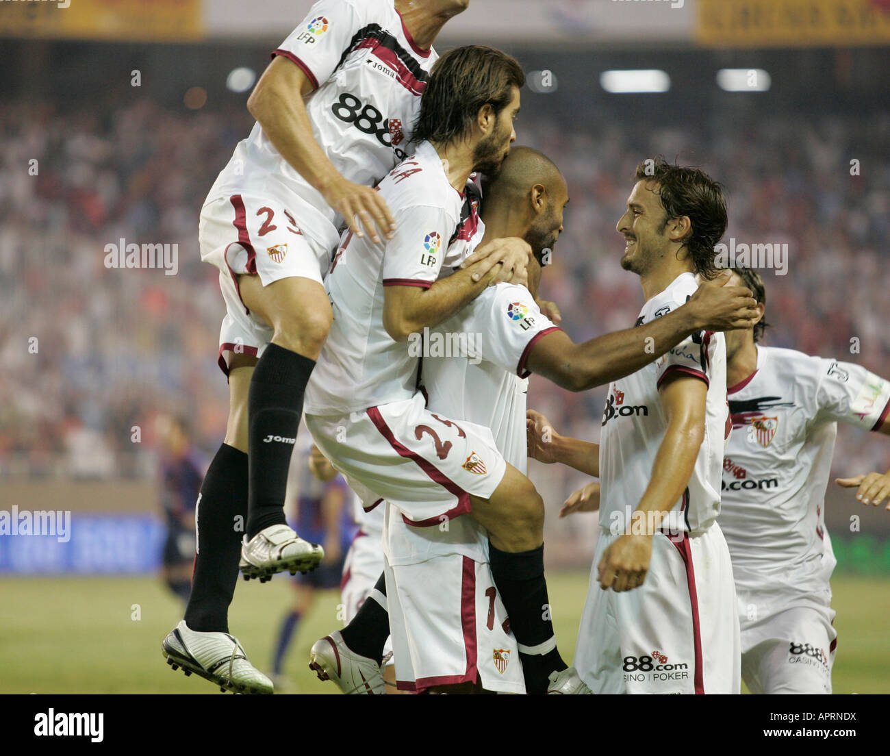 Kanoute and his fellows celebrating a goal Stock Photo - Alamy