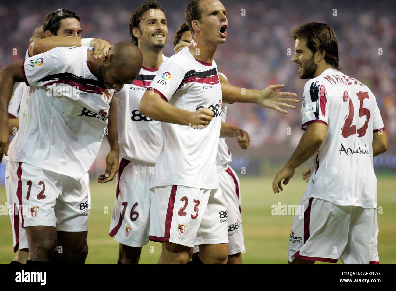 Kanoute and his fellows celebrating a goal Stock Photo - Alamy