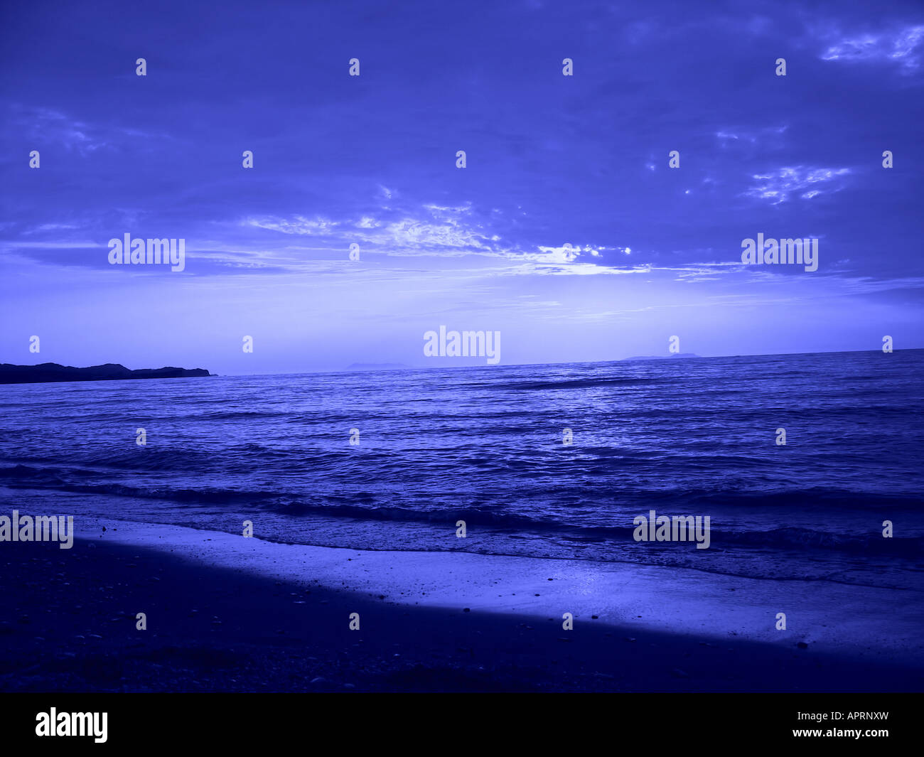 tired blue sunset on the islands Stock Photo - Alamy