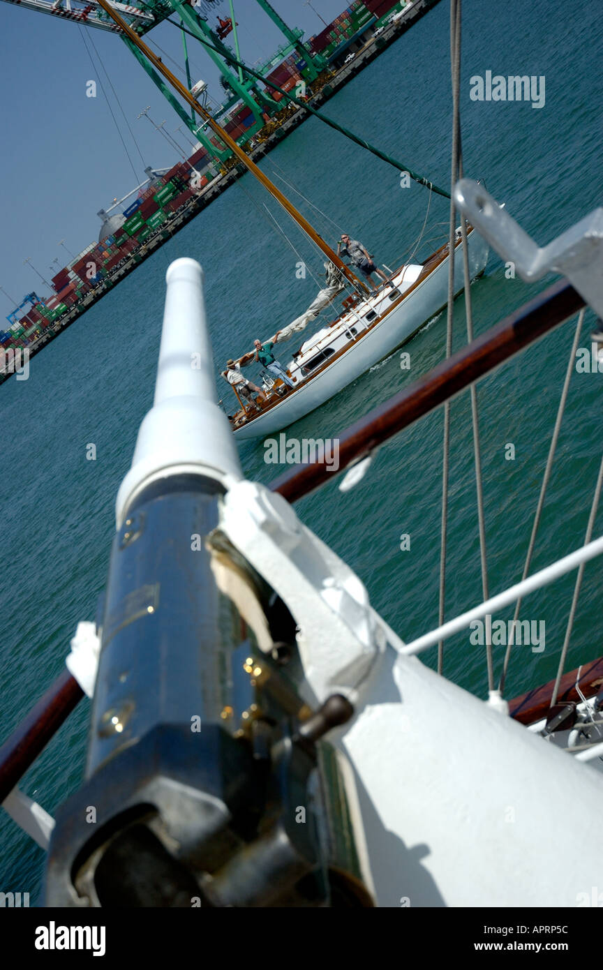 A cannon on the deck on the bow of tallship while anchored in Tallships ...