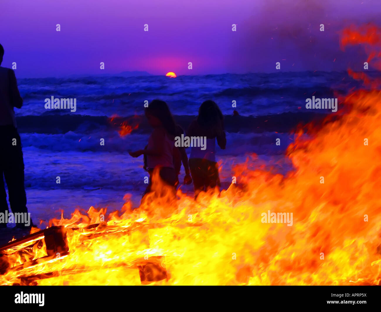 fire sunset party on the beach Stock Photo - Alamy