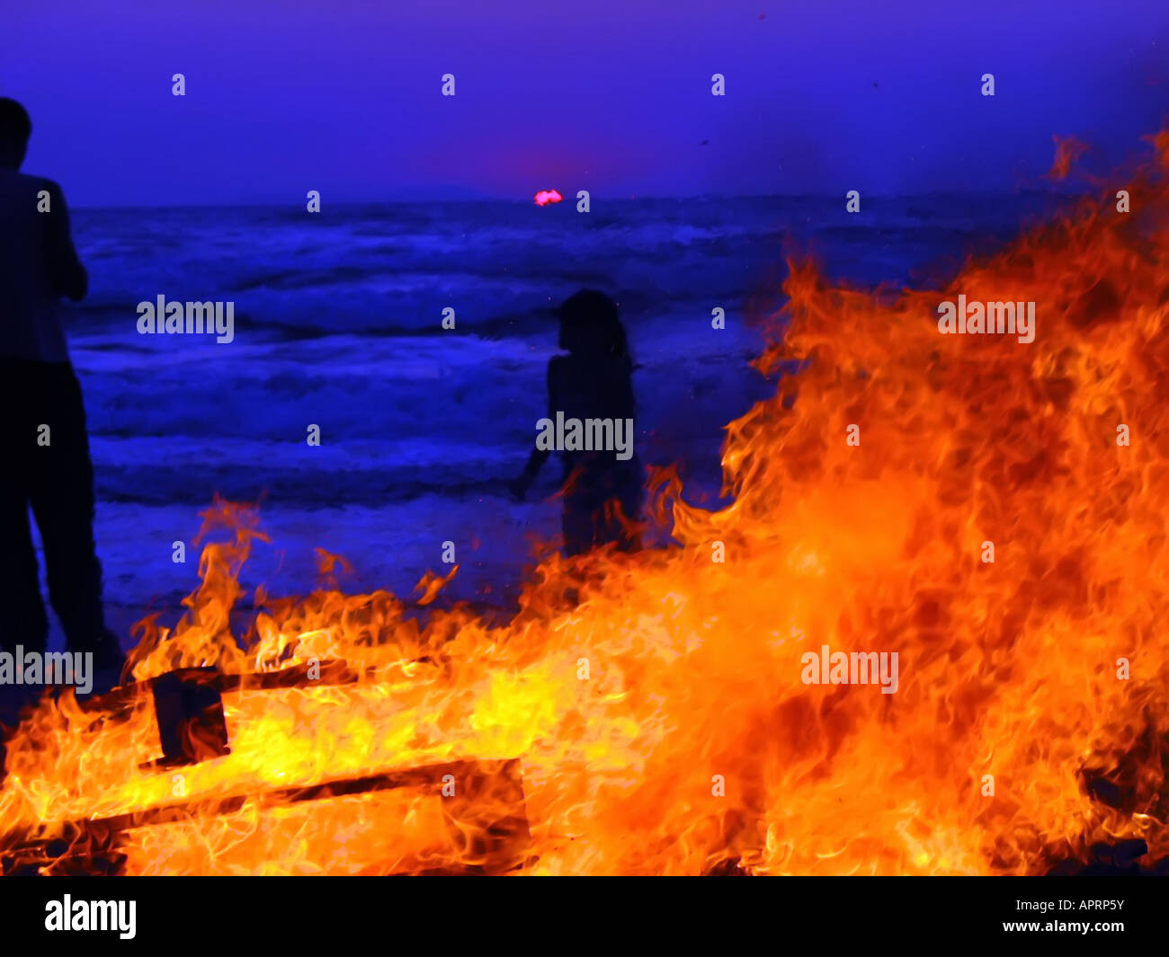 fire sunset party on the beach Stock Photo - Alamy