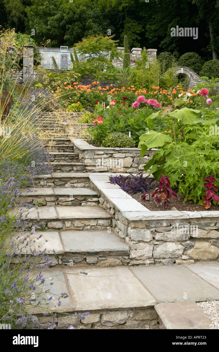 Yewbarrow House garden with exotic planting terrace of steps through ...