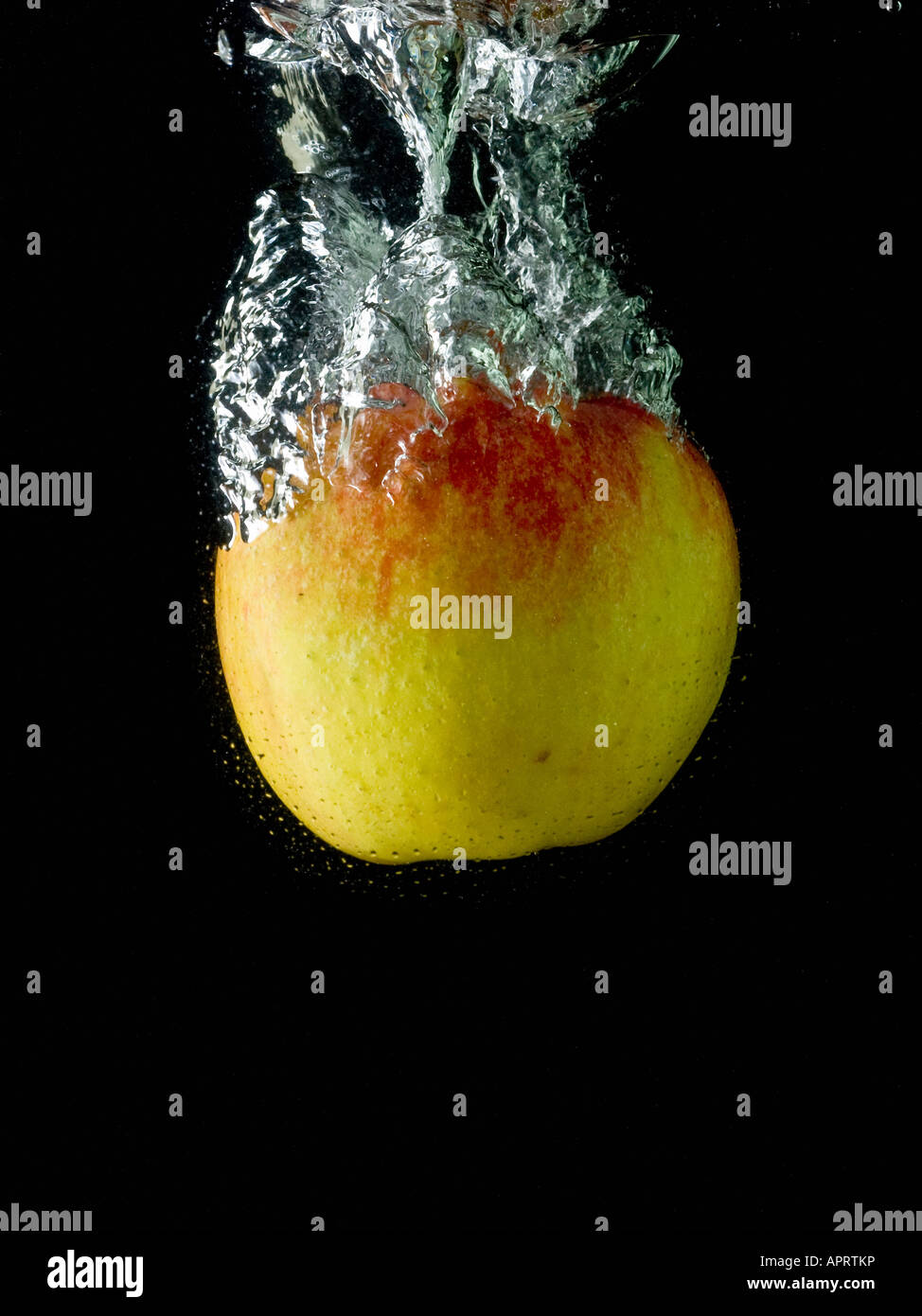 apple falling in the water Stock Photo - Alamy