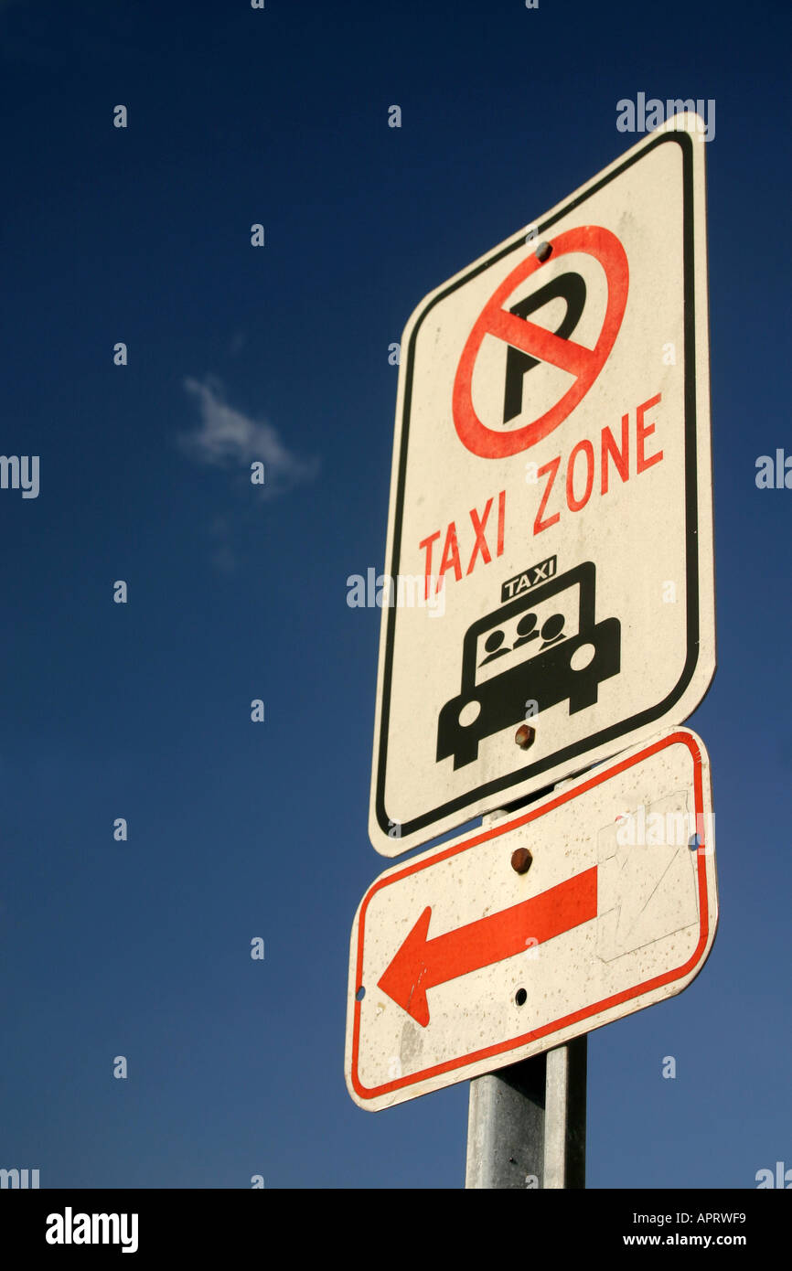 No Parking Restriction and Taxi Zone Sign Clearwater Beach Florida ...