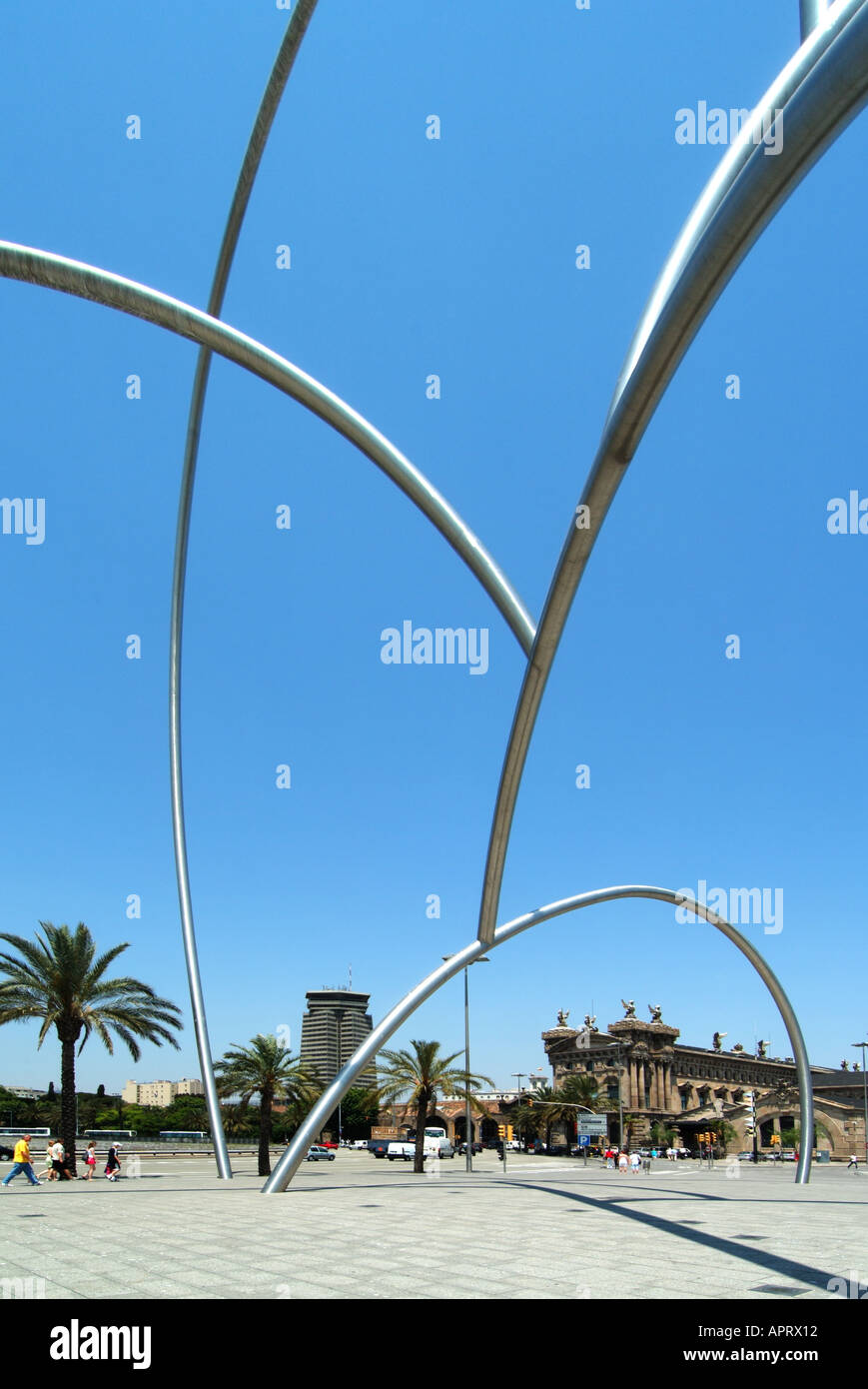 Stainless steel tubular sculpture over traffic roundabout & road ...