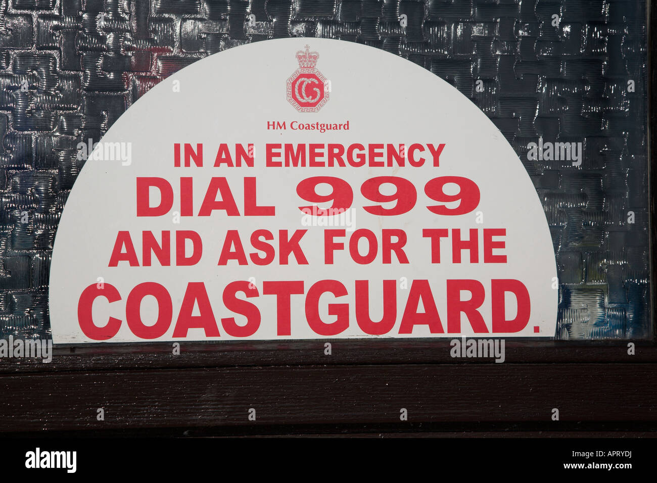 Sign Emergency Dial 999 for Coastguard Stock Photo - Alamy