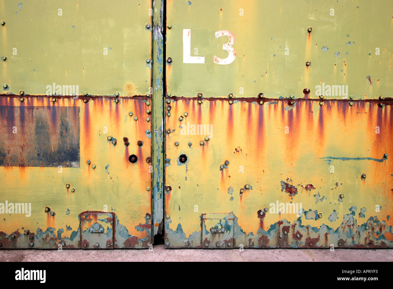 Rusty hangar door Stock Photo - Alamy