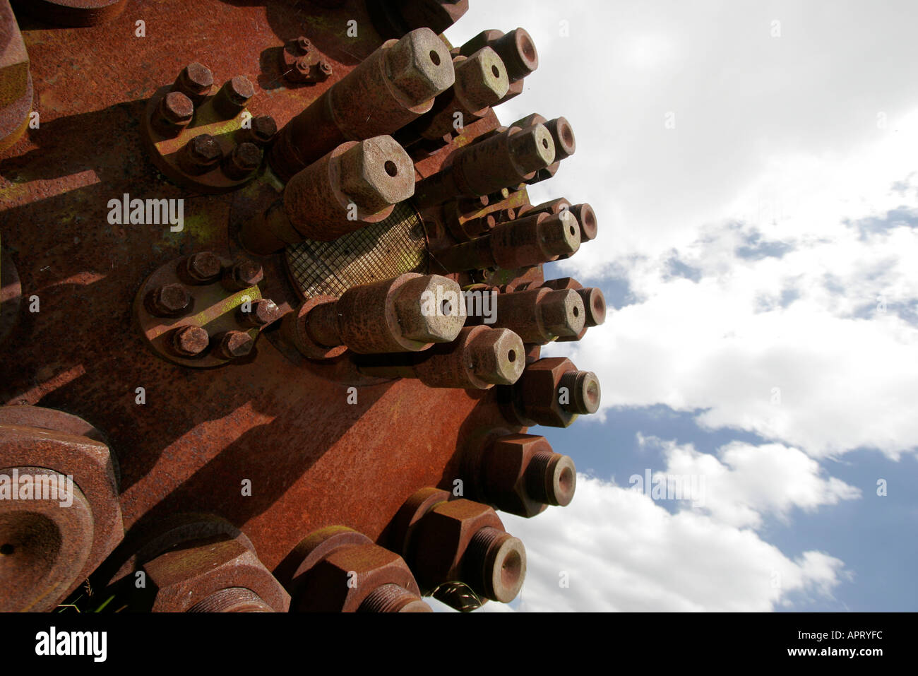 Part of a rusty old heat exchanger Stock Photo - Alamy