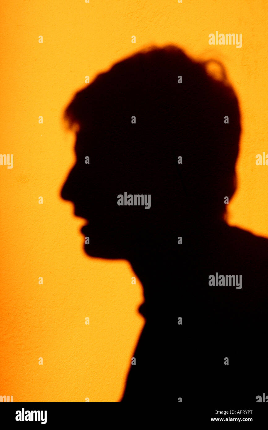 Shadow of the Head of Young Man Stock Photo - Alamy