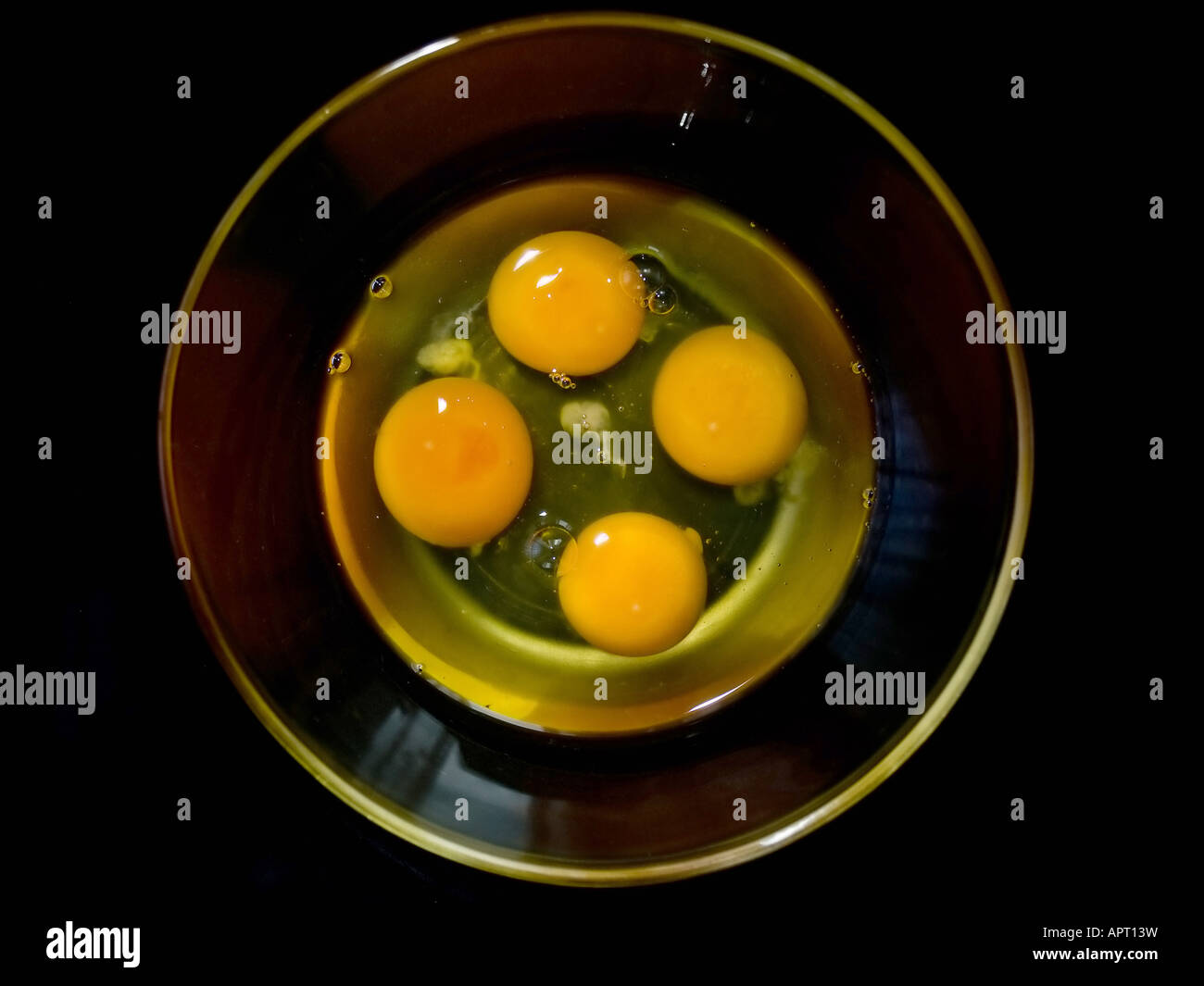 four eggs for omelet preparation Stock Photo - Alamy