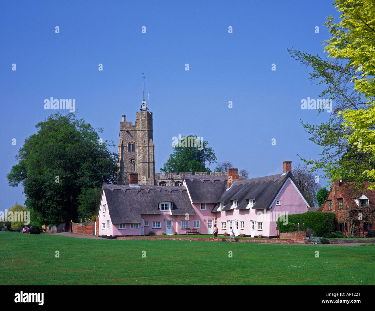 Pink cottages and village church, Cavendish, Suffolk, England Stock ...