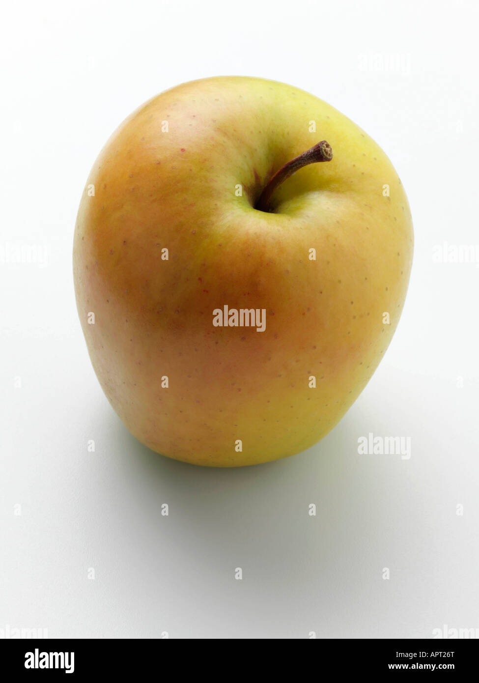 A Tentation Apple on a white background editorial food Stock Photo - Alamy