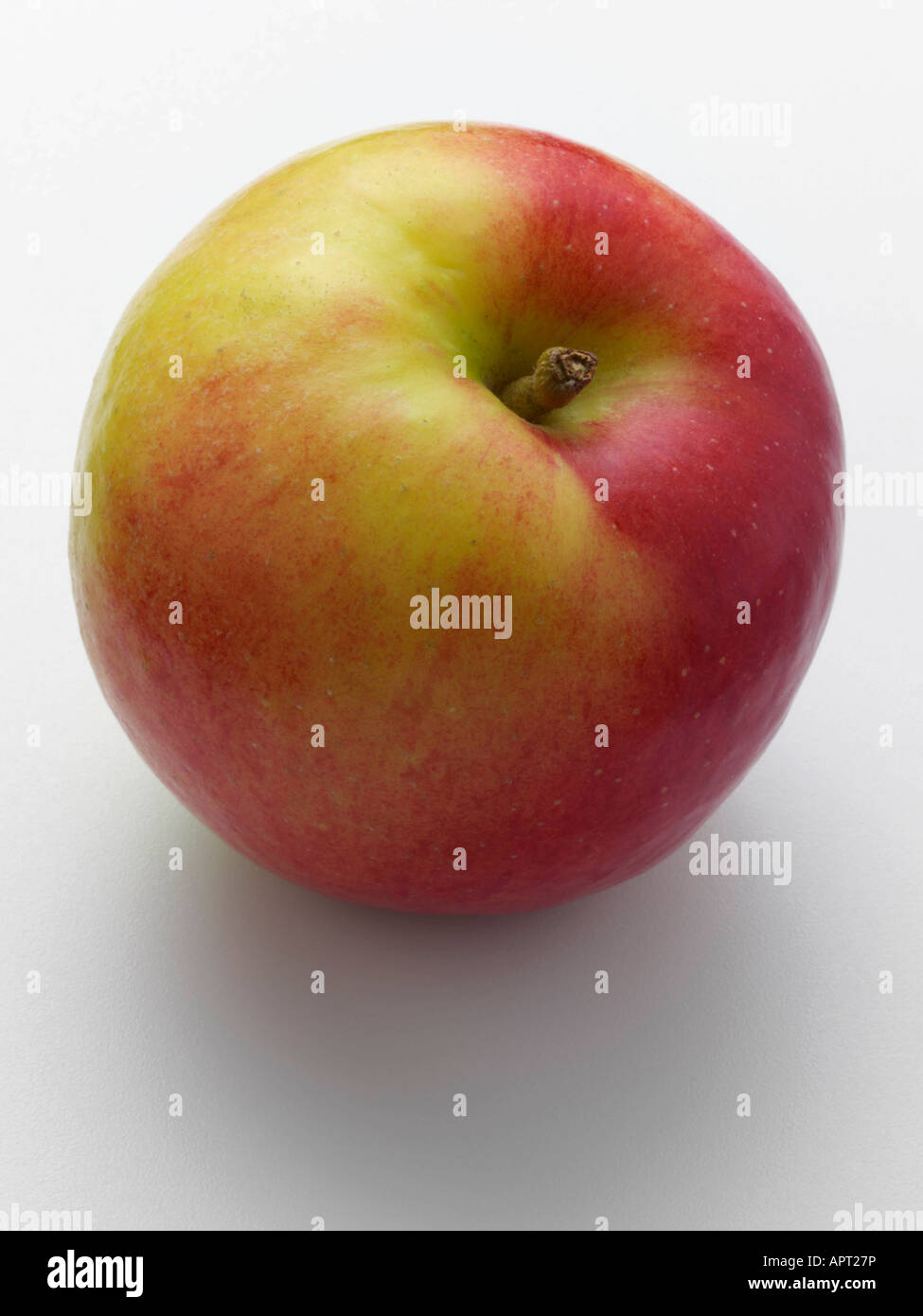 A Jazz apple on a white background editorial food Stock Photo - Alamy