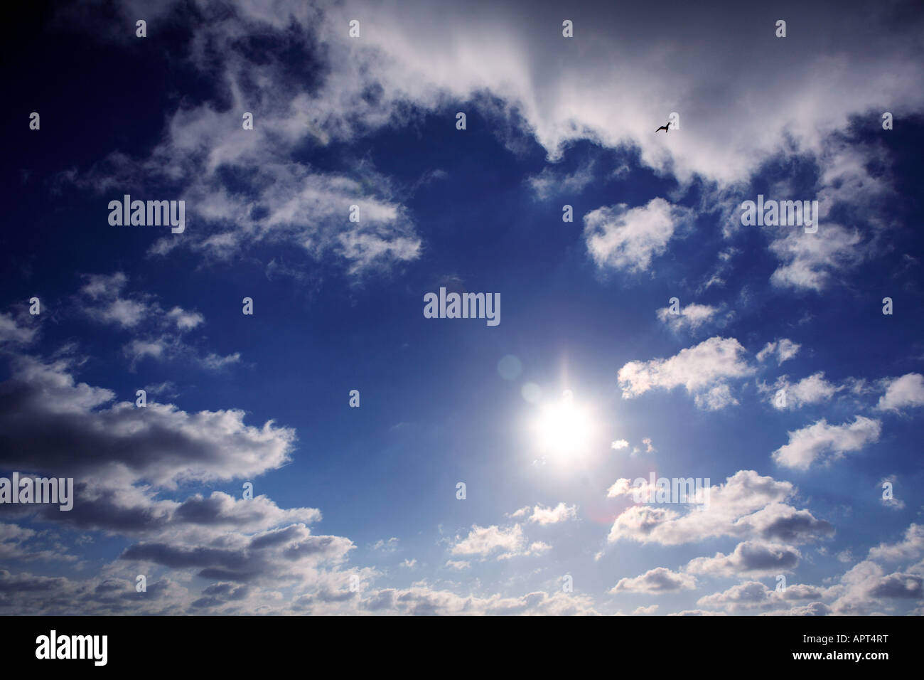 Sun appears from behind clouds Stock Photo - Alamy