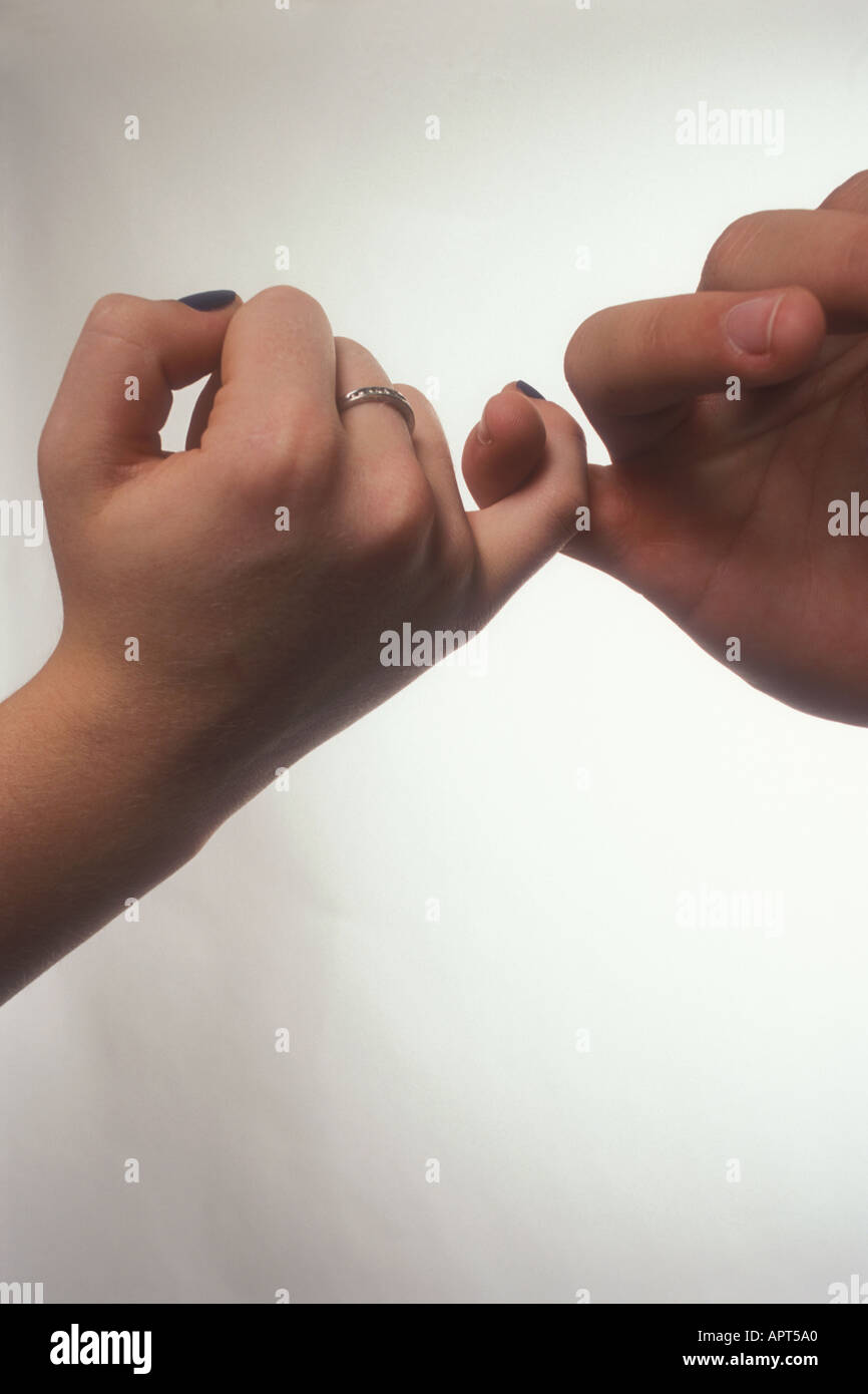 Fingers interlinked hi-res stock photography and images - Alamy