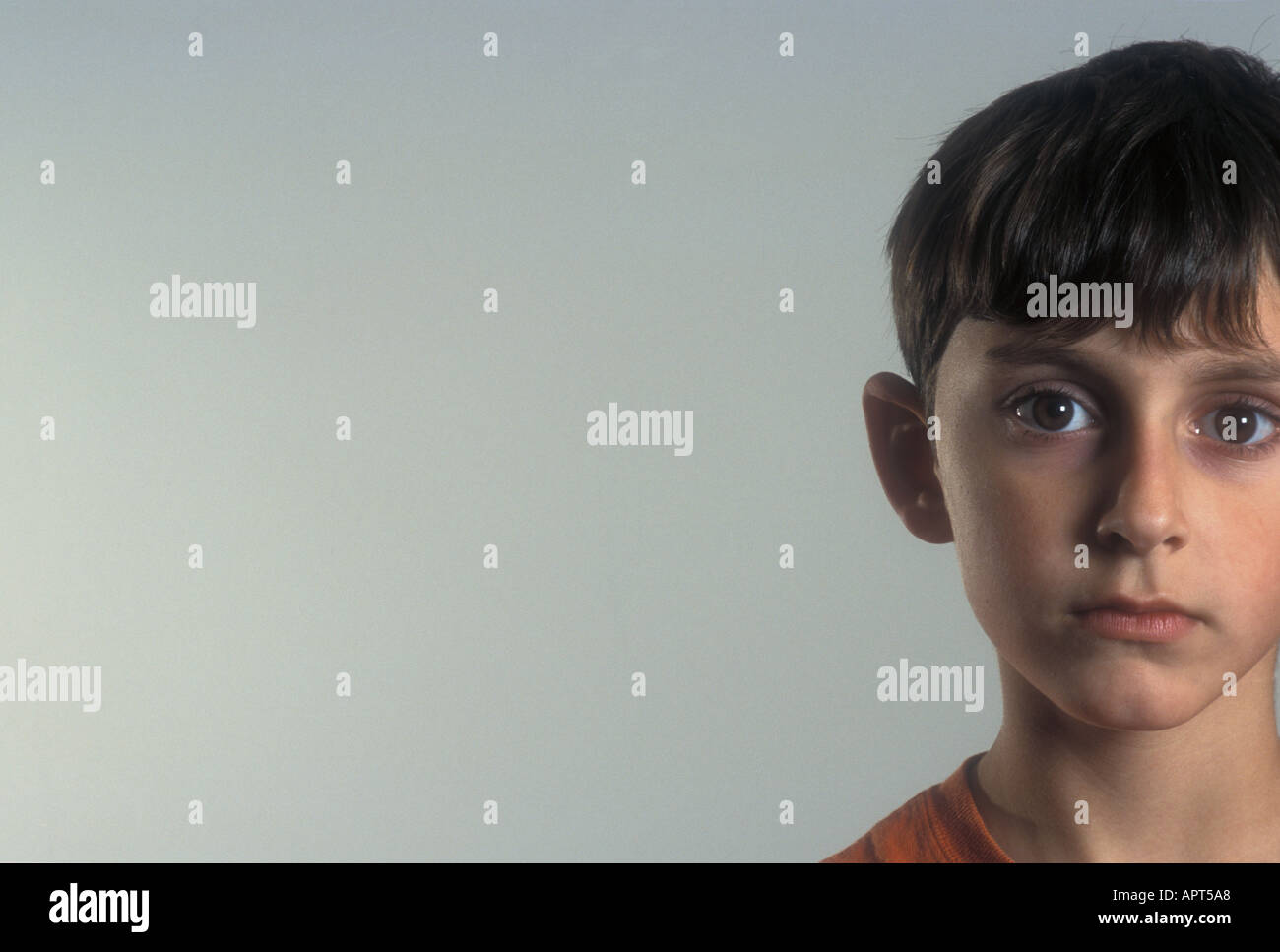 Sad Looking Boy Stock Photo - Alamy