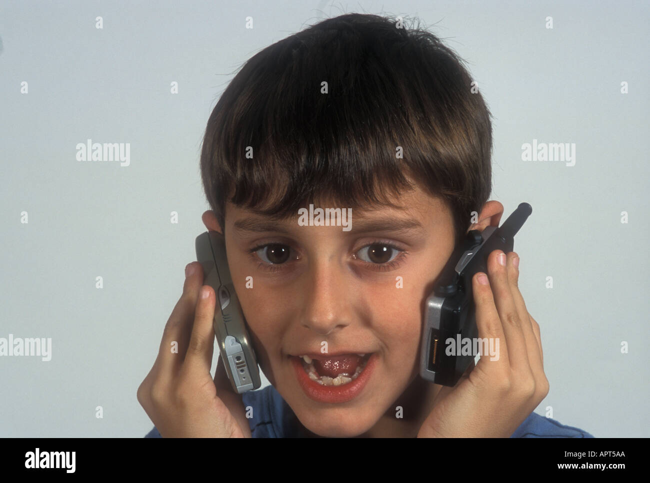 Boy talking to self on Cell Phones Stock Photo - Alamy