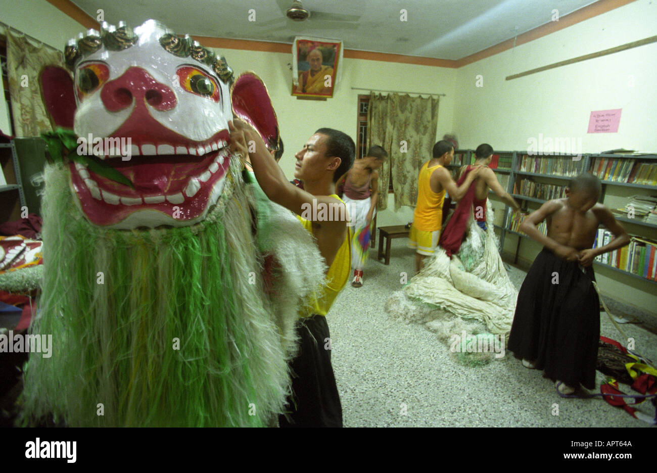A Tibetan Monk prepares a Snow Lion for a traditional performance There ...