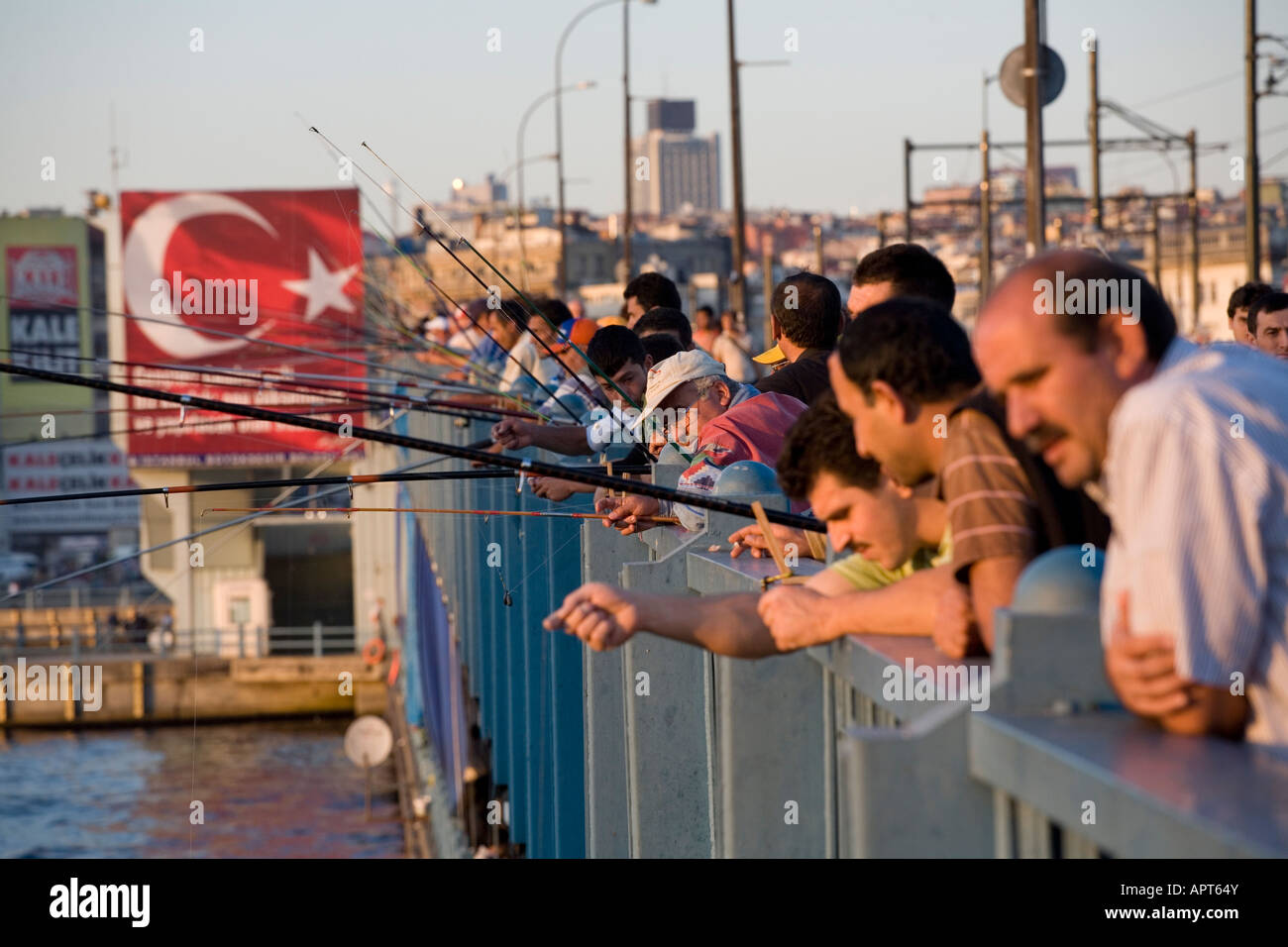 Anglers men fishing on the Galata Bridge, Istanbul, Turkey Stock Photo ...