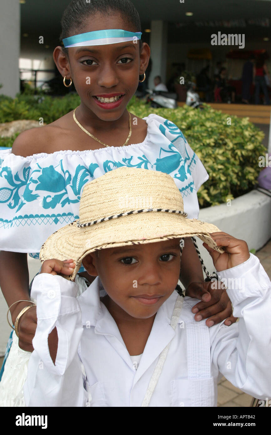 Hispanic boy boys male kids children straw hat hi-res stock photography ...