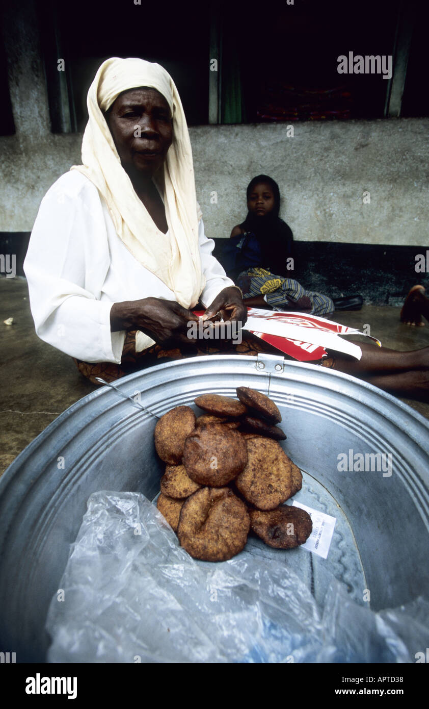 Malawi East Africa Female food vendor sells fried snacks Stock Photo ...