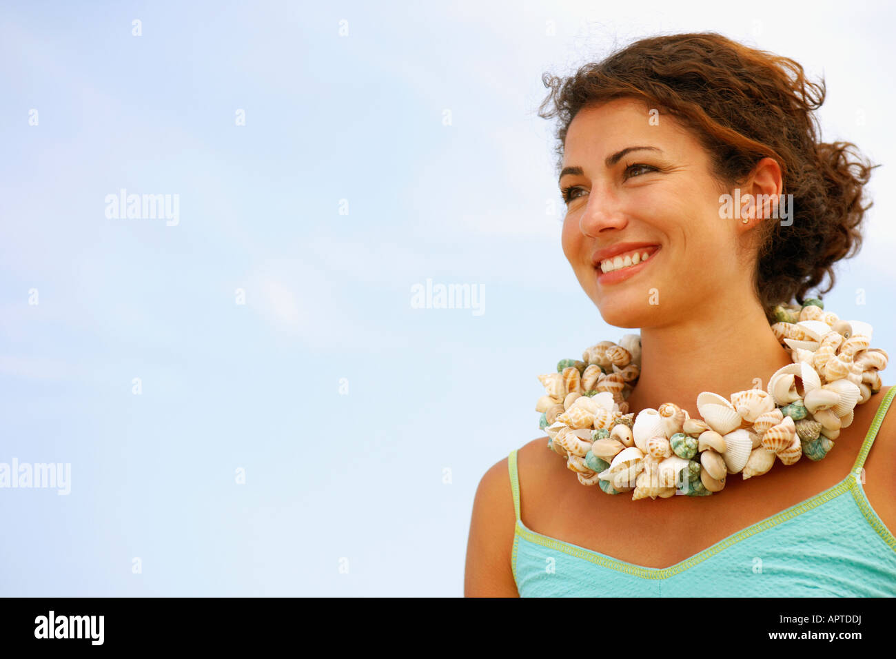 Woman wearing seashell necklace Stock Photo - Alamy