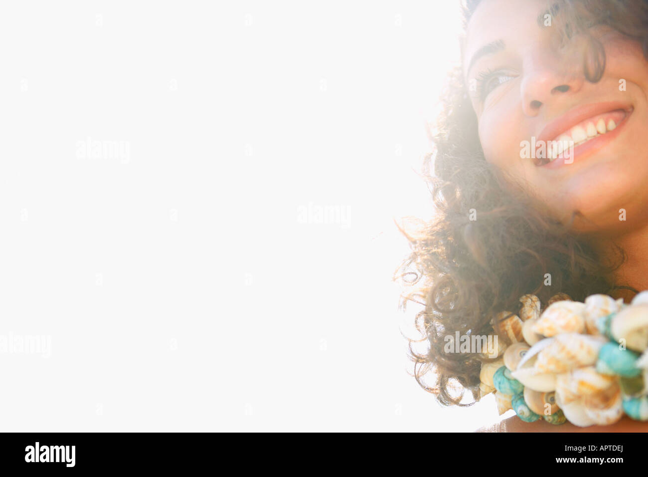 Woman wearing seashell necklace Stock Photo - Alamy