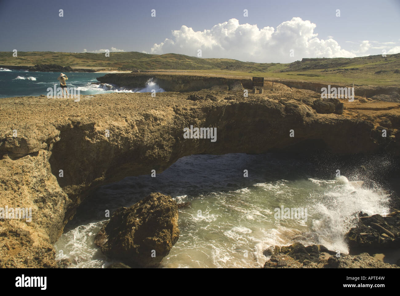 Natural Bridge on rocky north shore of Aruba at Boca Andicuri Stock ...