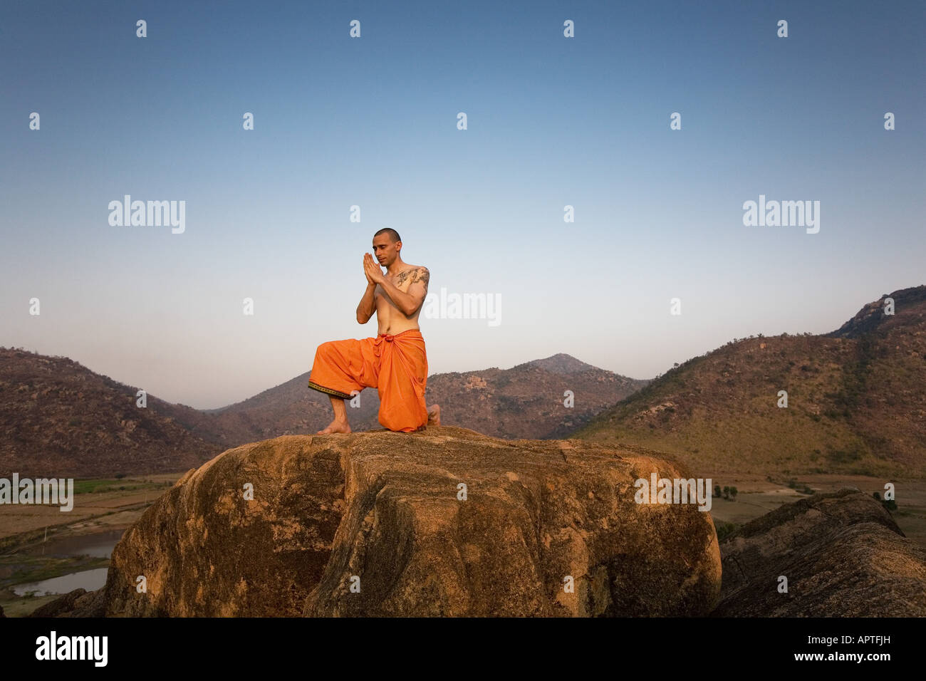 Praying On Top Of The Mountain Stock Photos & Praying On Top Of The ...