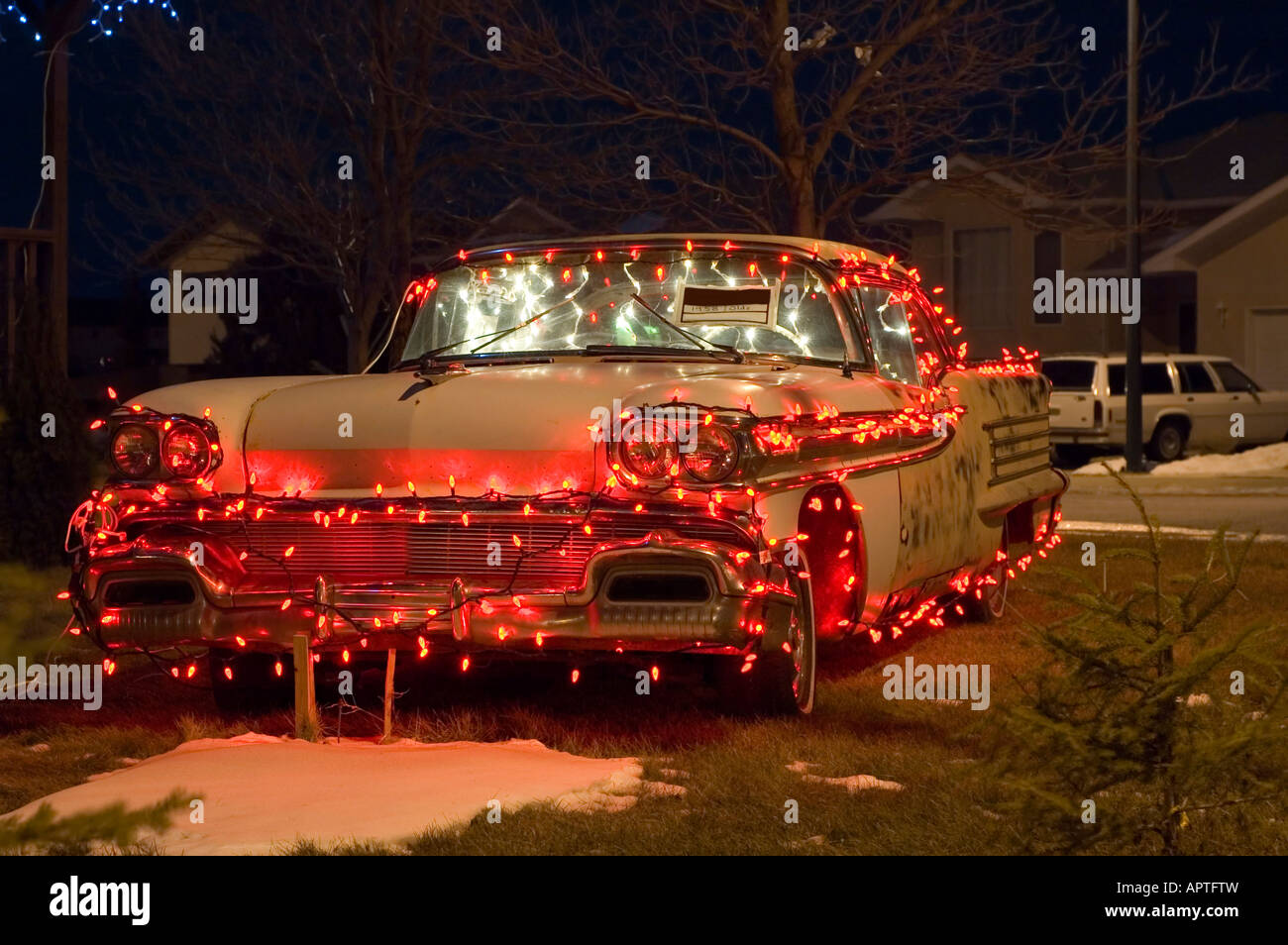 1958 Oldsmobile covered in Christmas lights Stock Photo - Alamy