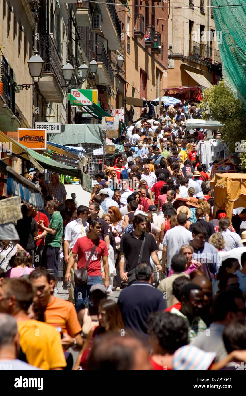 Busy street market of El Rastro Madrid Spain Stock Photo - Alamy