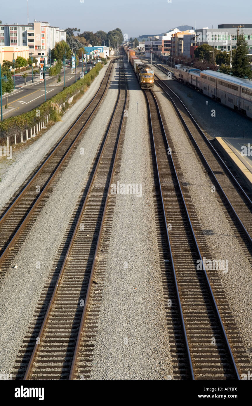 Freight Train On Railroad With Cargo Stock Photo - Alamy