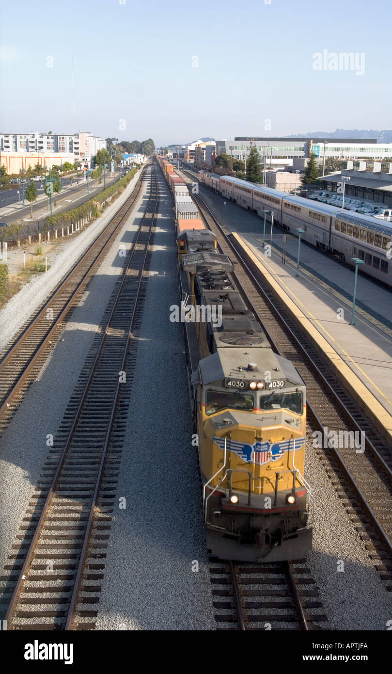 Freight Train On Railroad With Cargo Stock Photo - Alamy