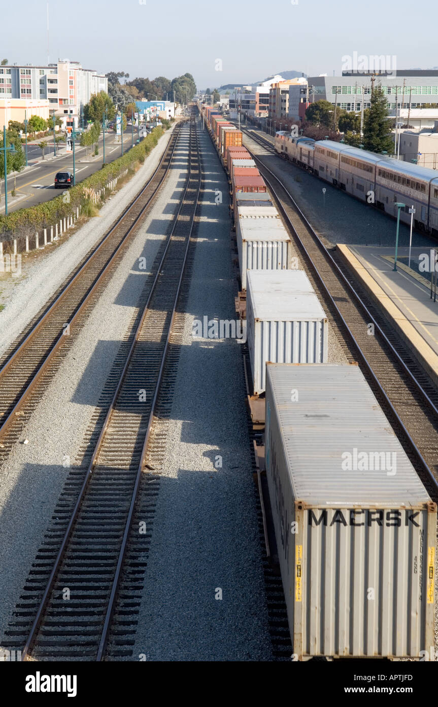 Freight Train On Railroad With Cargo Stock Photo - Alamy