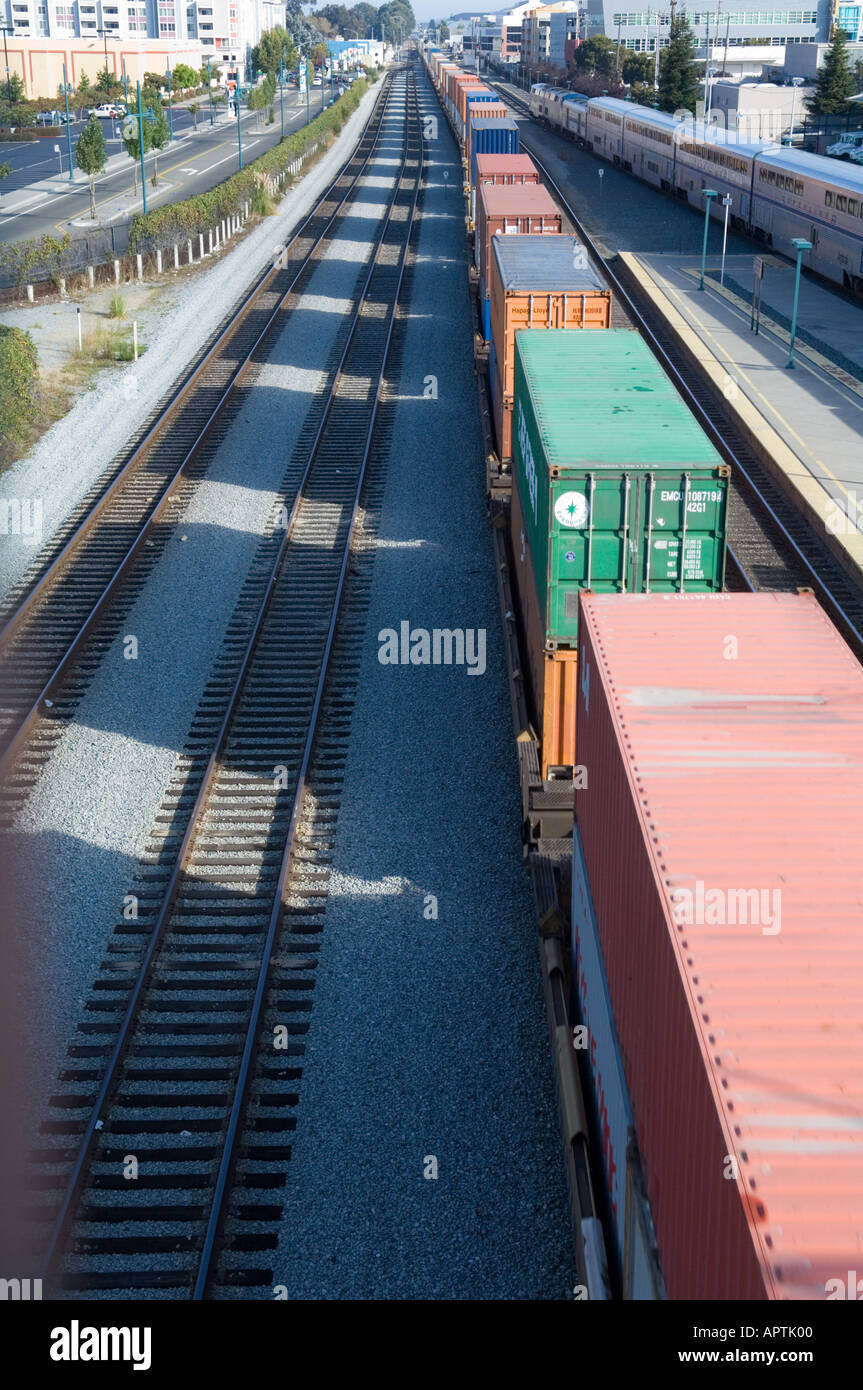 Freight Train On Railroad With Cargo Stock Photo - Alamy