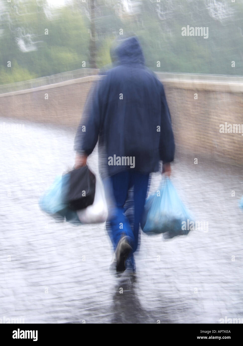 Shopping man carrying bags detail hi-res stock photography and images ...
