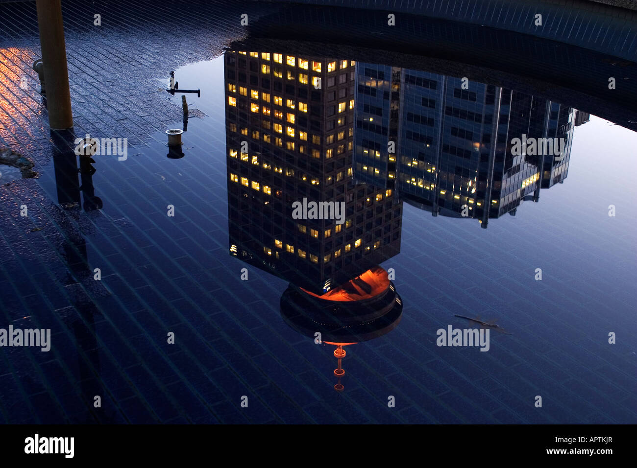 A reflection of the Harbour center tower at dusk Stock Photo - Alamy