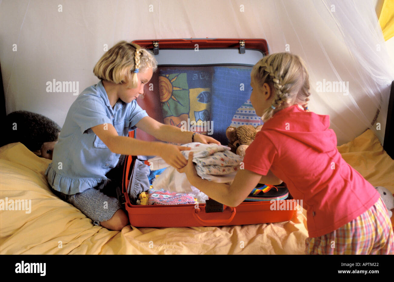 Packing his suitcase hi-res stock photography and images - Alamy